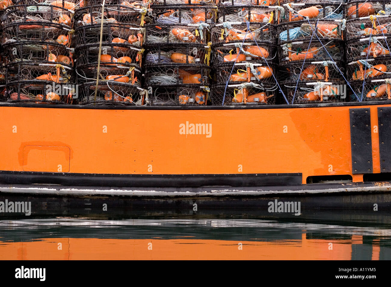 A fishing boat loaded with crab pots awaits the beginning of crabbing ...