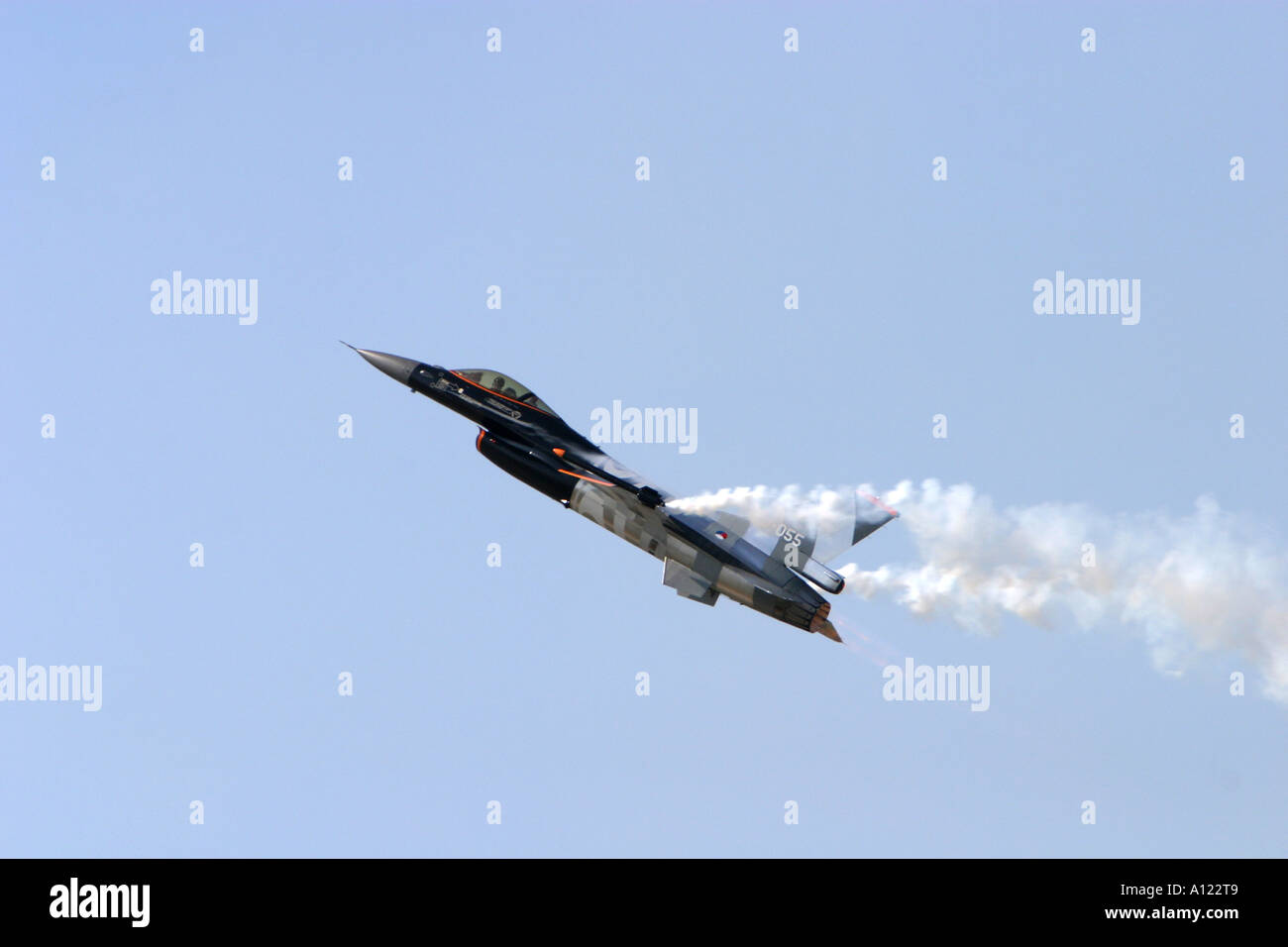 F16 military fighter jet performing an acrobatic display Stock Photo ...
