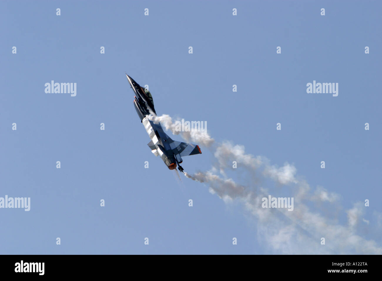 F16 military fighter jet performing an acrobatic display Stock Photo ...