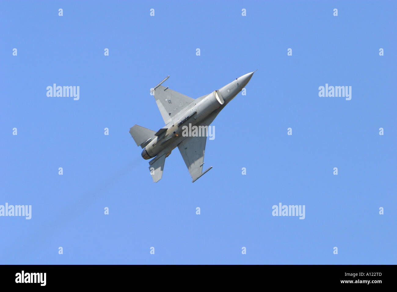 F16 military fighter jet performing an acrobatic display Stock Photo ...