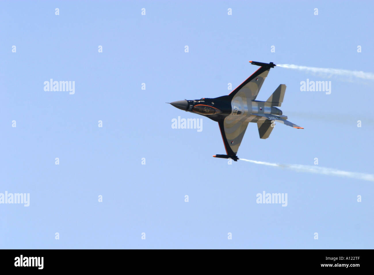 F16 military fighter jet performing an acrobatic display Stock Photo ...
