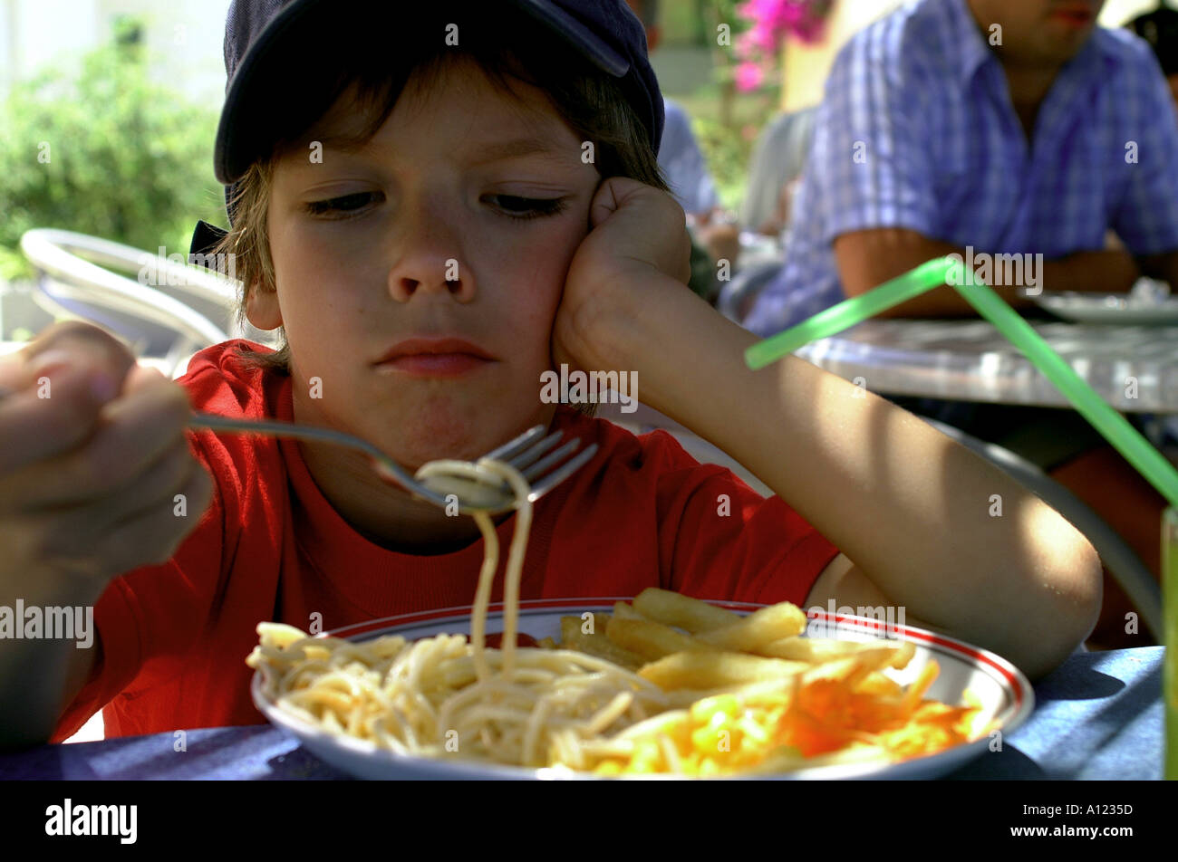 boy eating pasta Stock Photo - Alamy