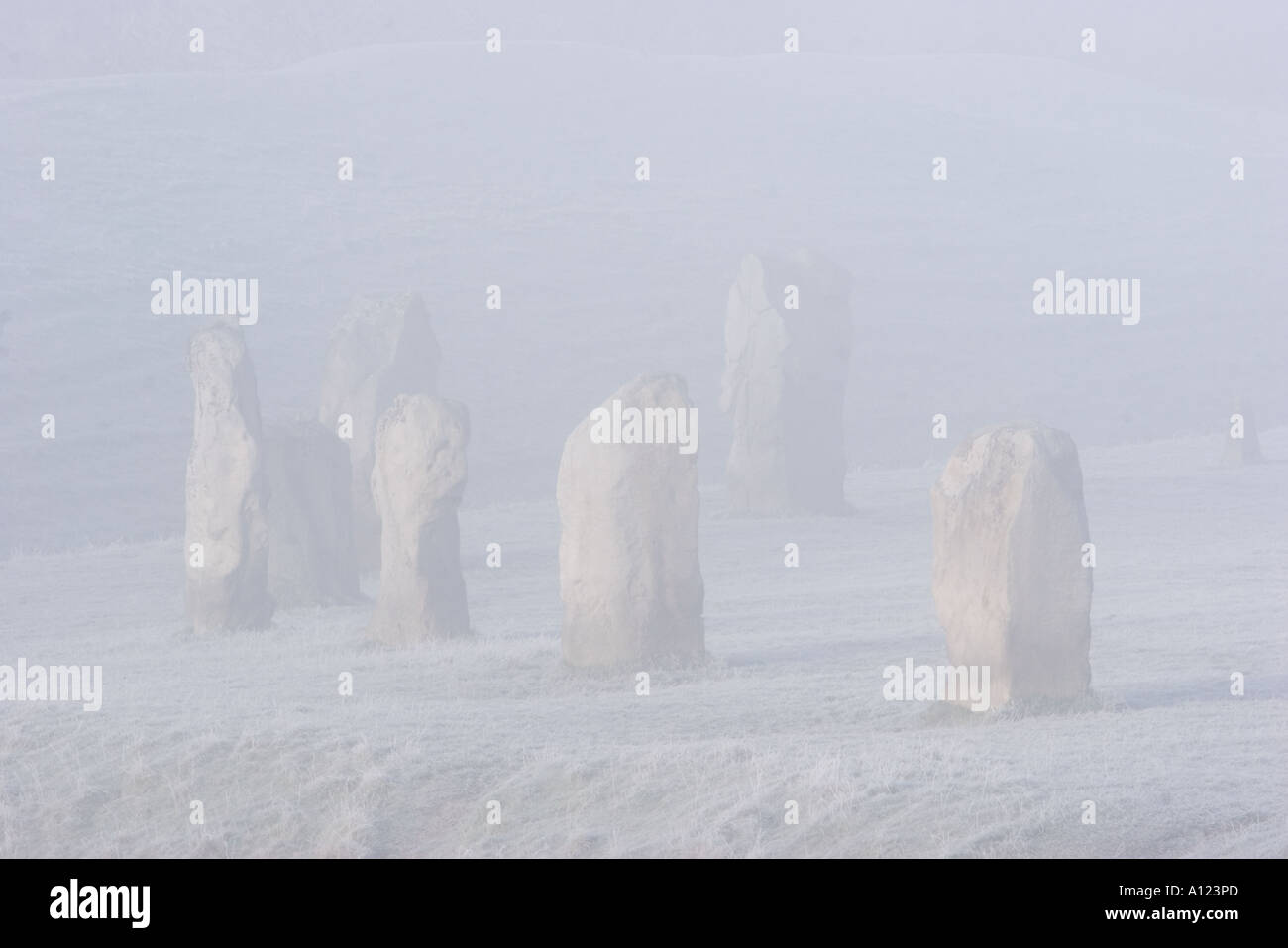 Avebury stone circle shrouded in fog on a frosty winter morning Stock ...