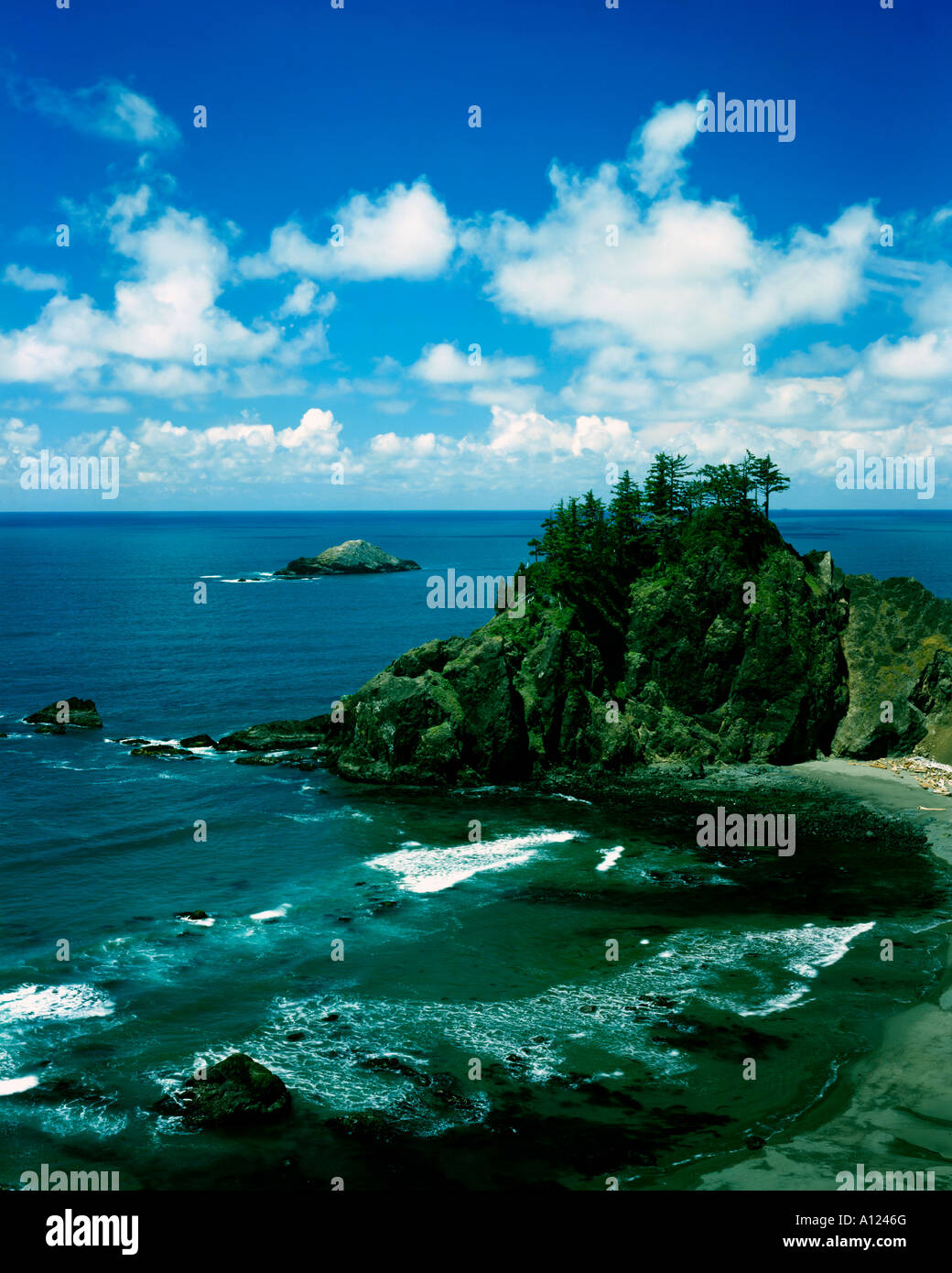 Hook Cape projects into the Pacific Ocean North of the small town of ...