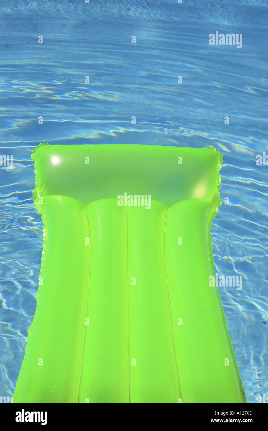 Green Raft In Blue Pool Stock Photo - Alamy