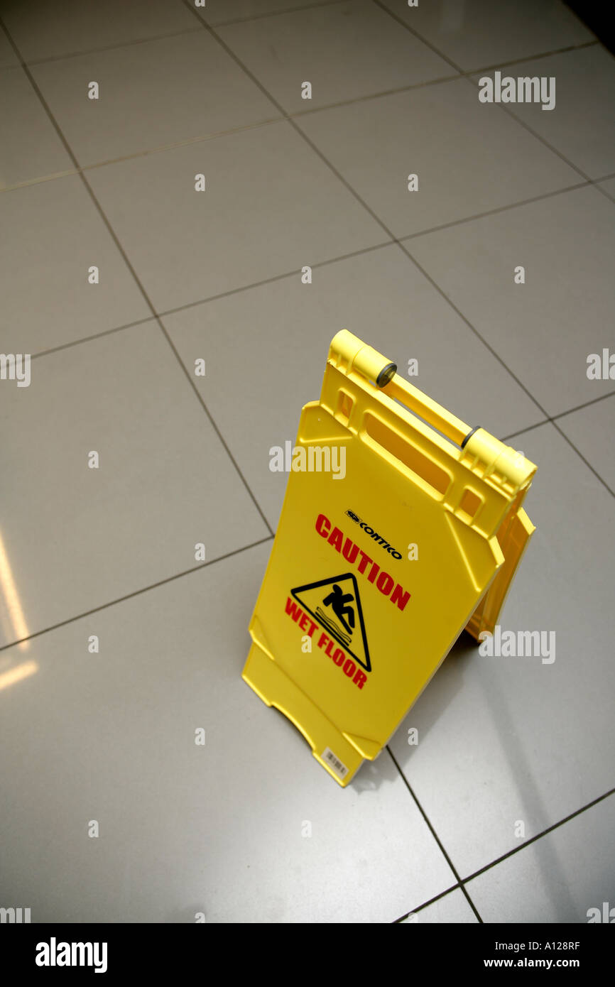 Wet floor sign Stock Photo - Alamy