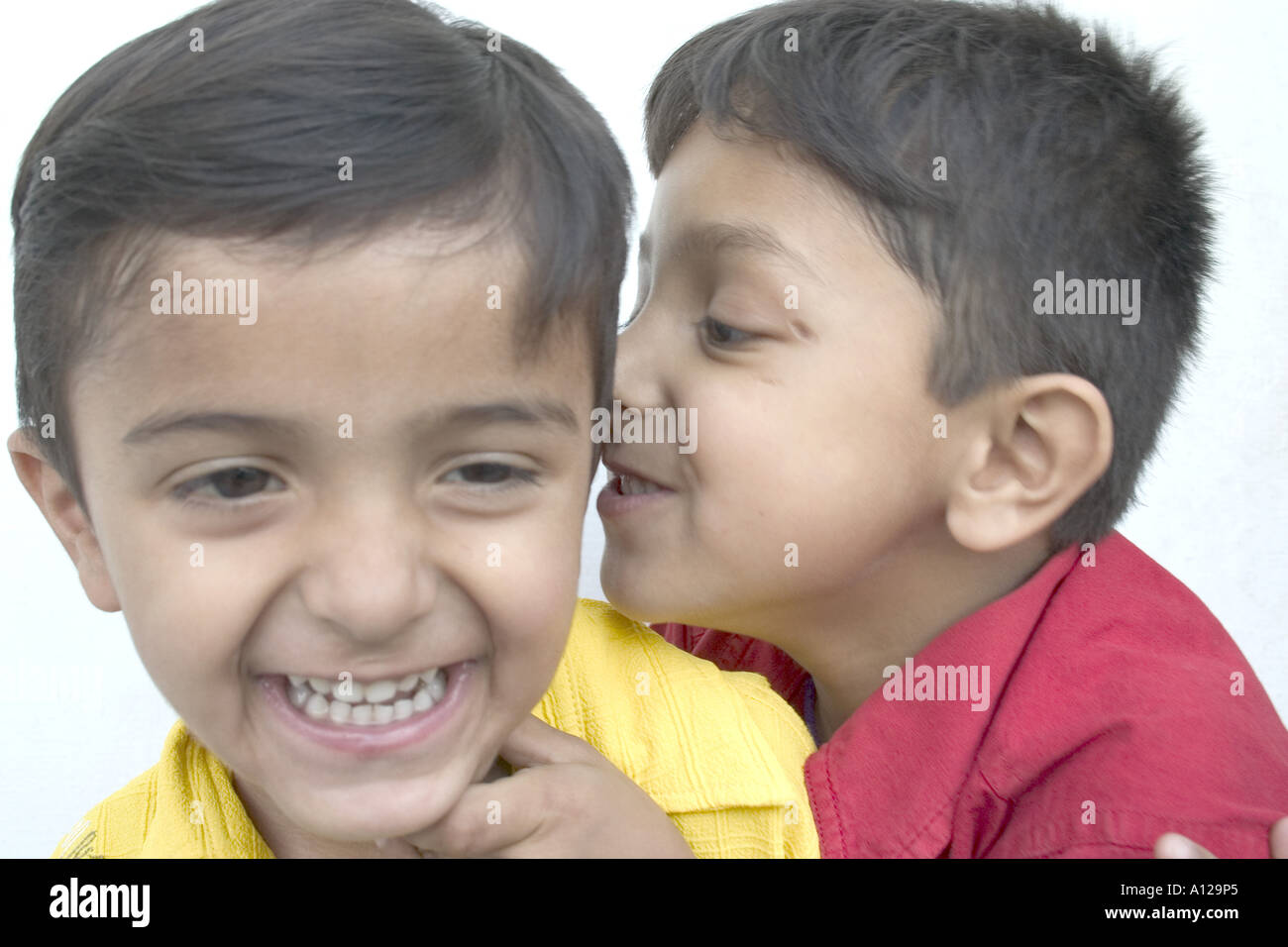 Whisper in friends ear hi-res stock photography and images - Alamy