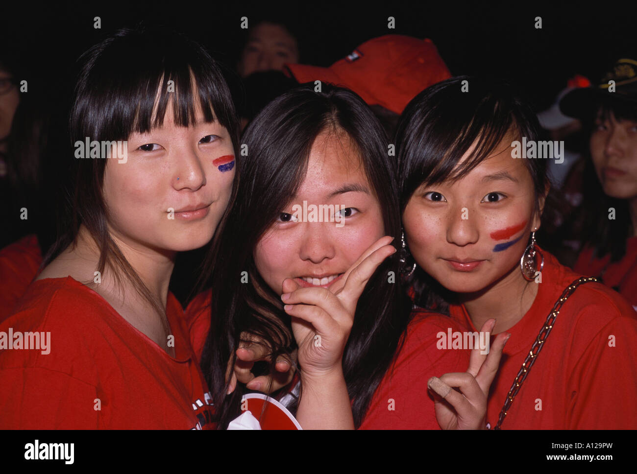 Three female Korean football fans in New Malden Surrey World Cup 2006 ...