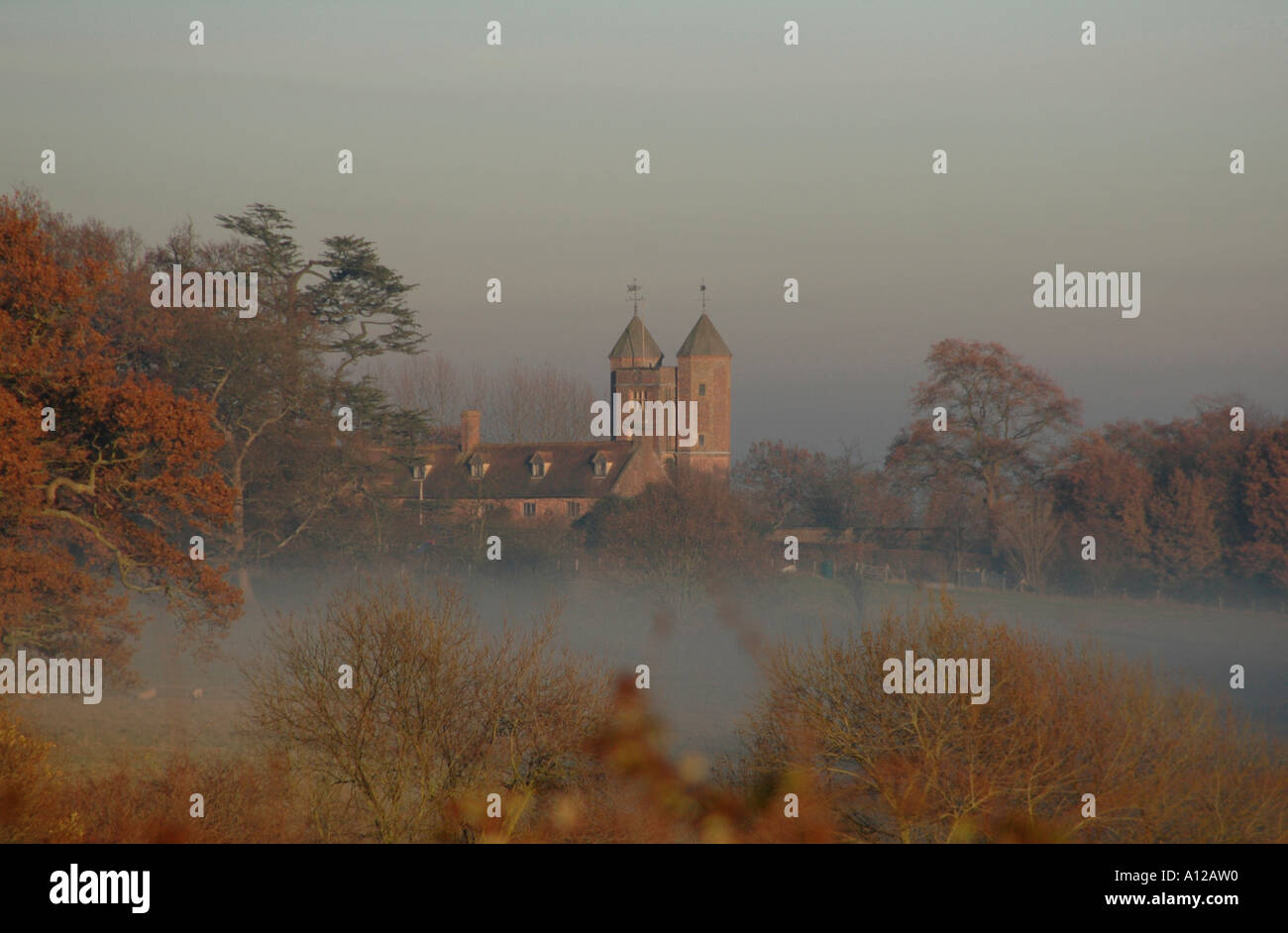 The tower of Sissinghurst castle on a misty winter evening Stock Photo ...
