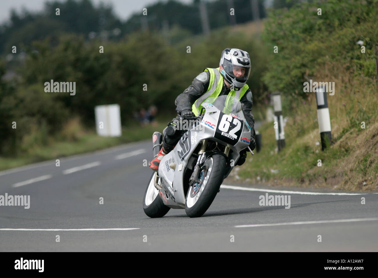 newcomer Brian Loughlin 62 in hi vis yellow vest on his Honda 400 ...