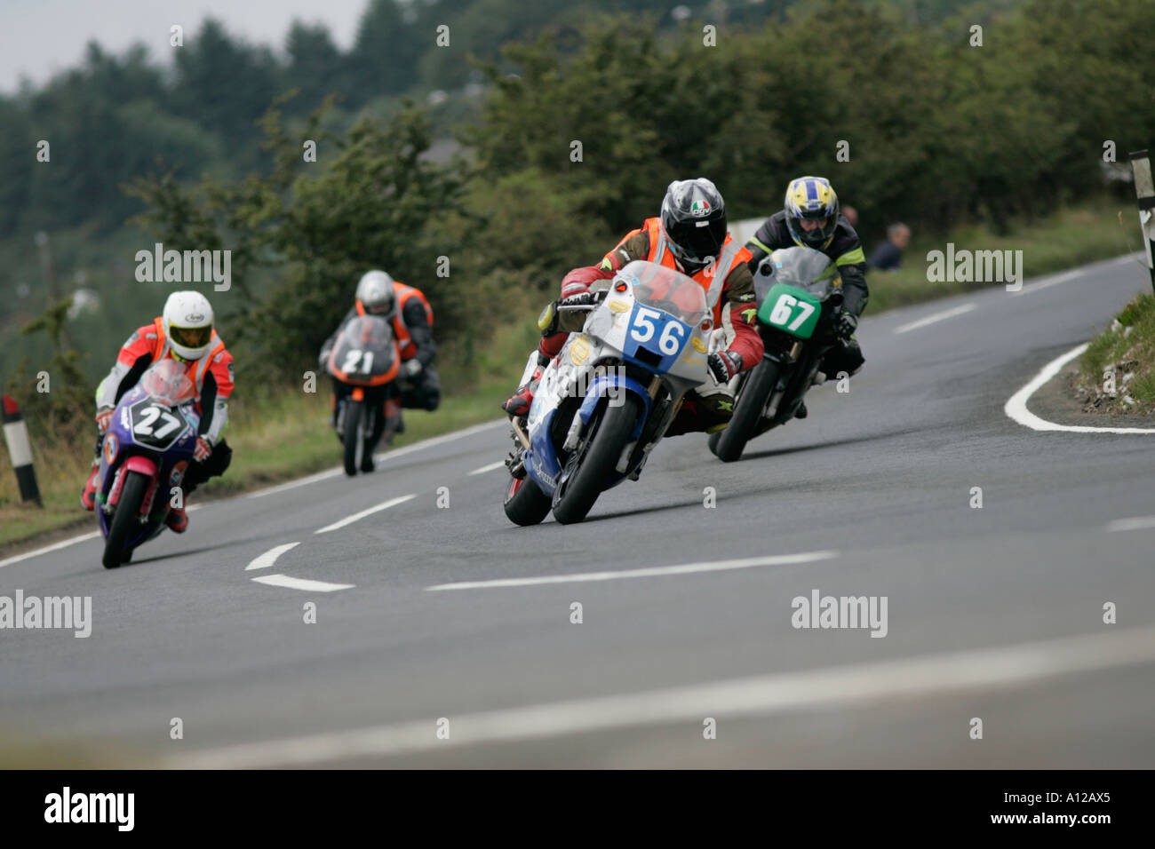 Denis Booth 56 on his suzuki leads simon barron 67 on his honda during ...