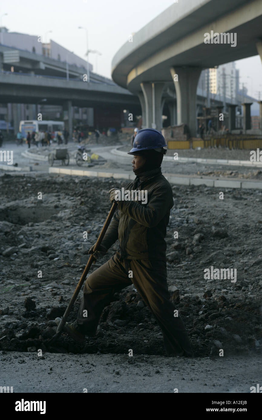 Chinese worker wearing hard hat Stock Photo - Alamy
