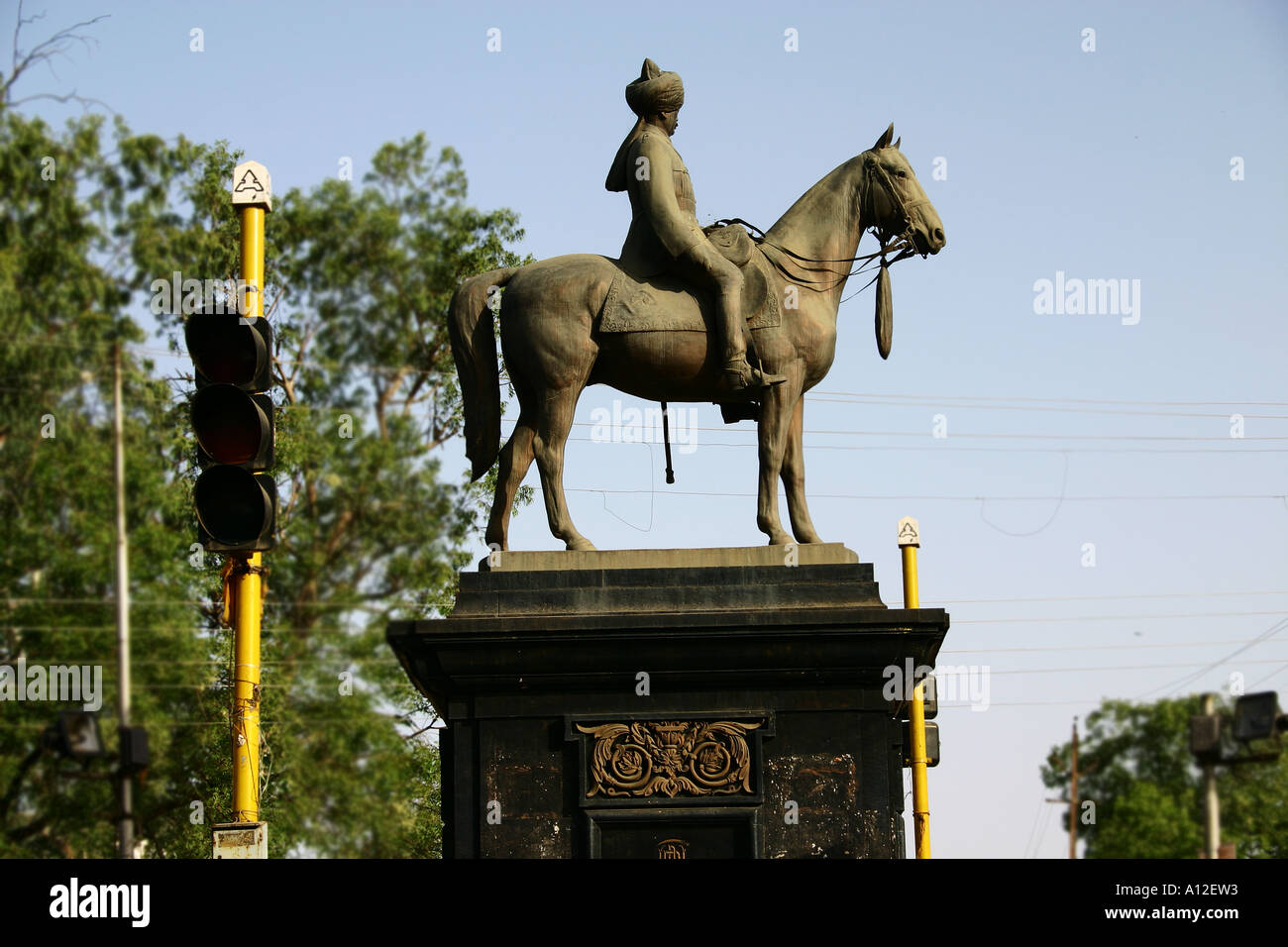 Sculpture of black stone man sitting on horse and signal, Dhar, Madhya ...