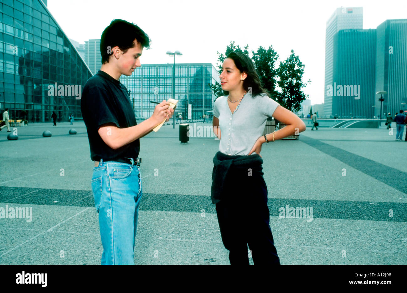 Paris France, Young male teen Journalist Interviewing Young Female in ...
