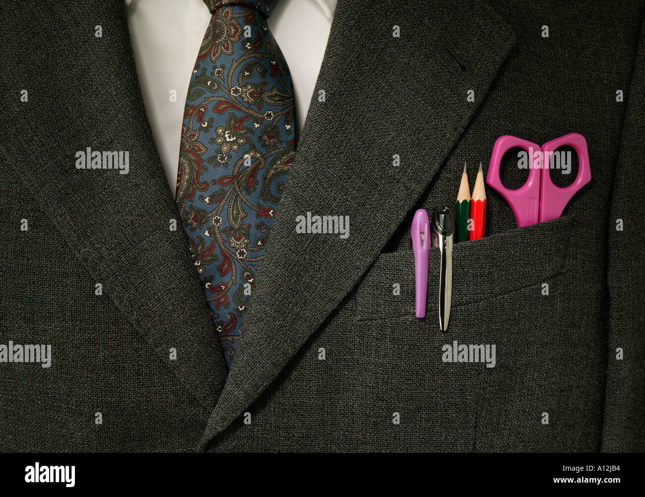 Mens suit jacket with pens pencils and scissors in the top pocket Stock ...