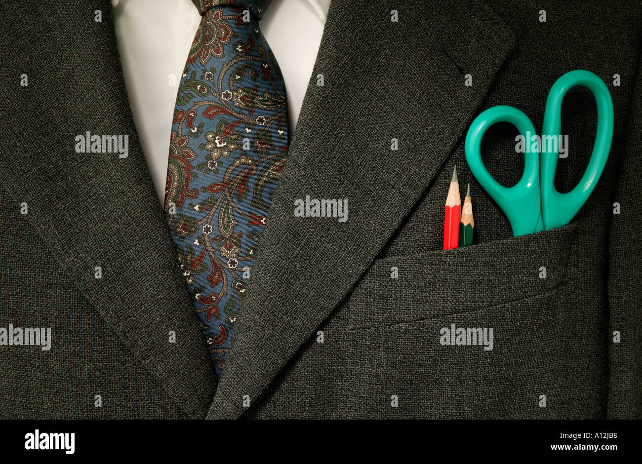 Mens suit jacket with two pencils and scissors in the top pocket Stock ...