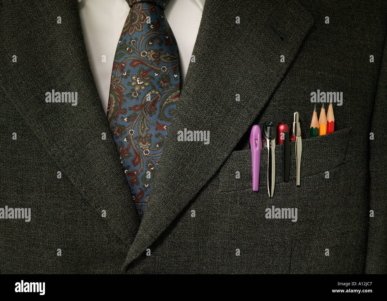 Mens suit jacket with pens and pencils in the top pocket Stock Photo ...