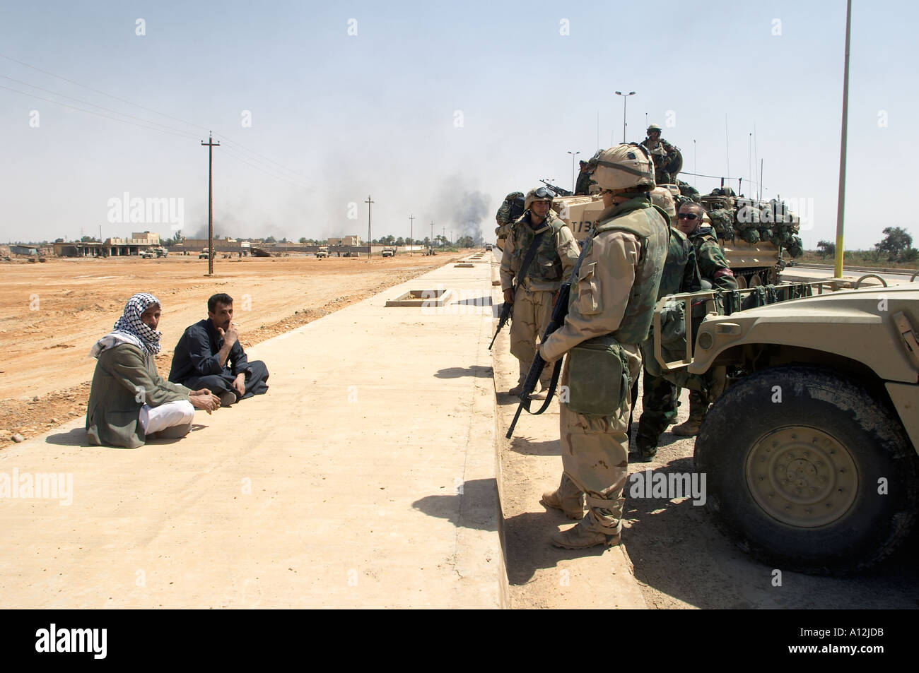 March 2003 Al Kut Iraq US Marines take prisoners while on the move ...