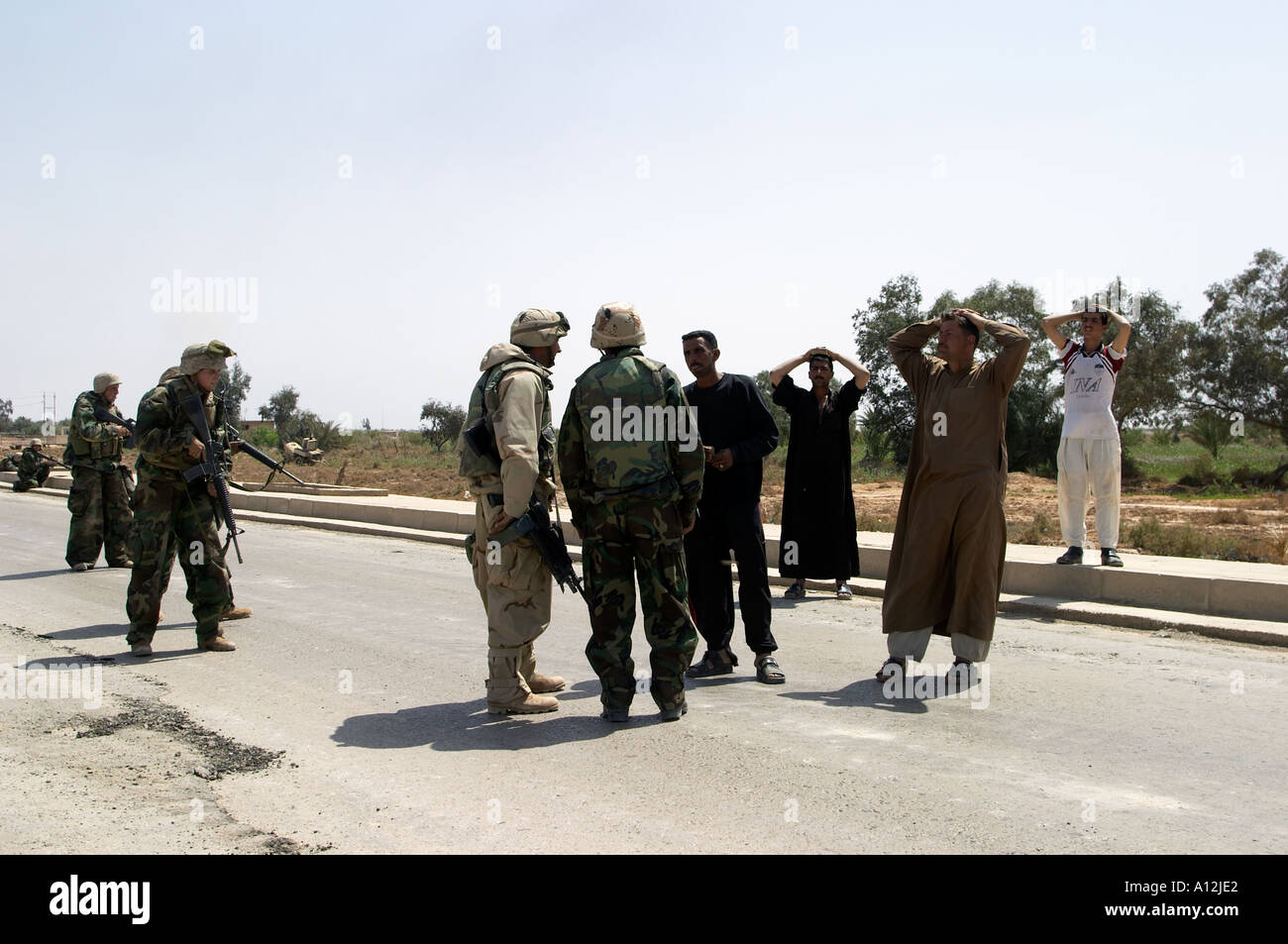 March 2003 Al Kut Iraq iraqi men surrender to US Marines on the move ...