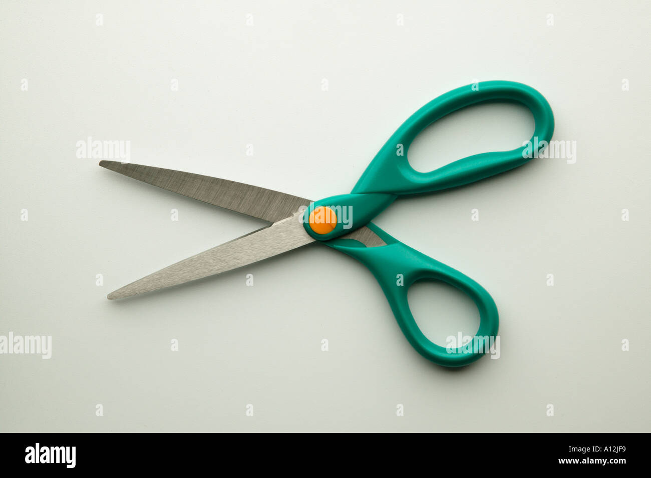 Open scissors on white background Stock Photo - Alamy