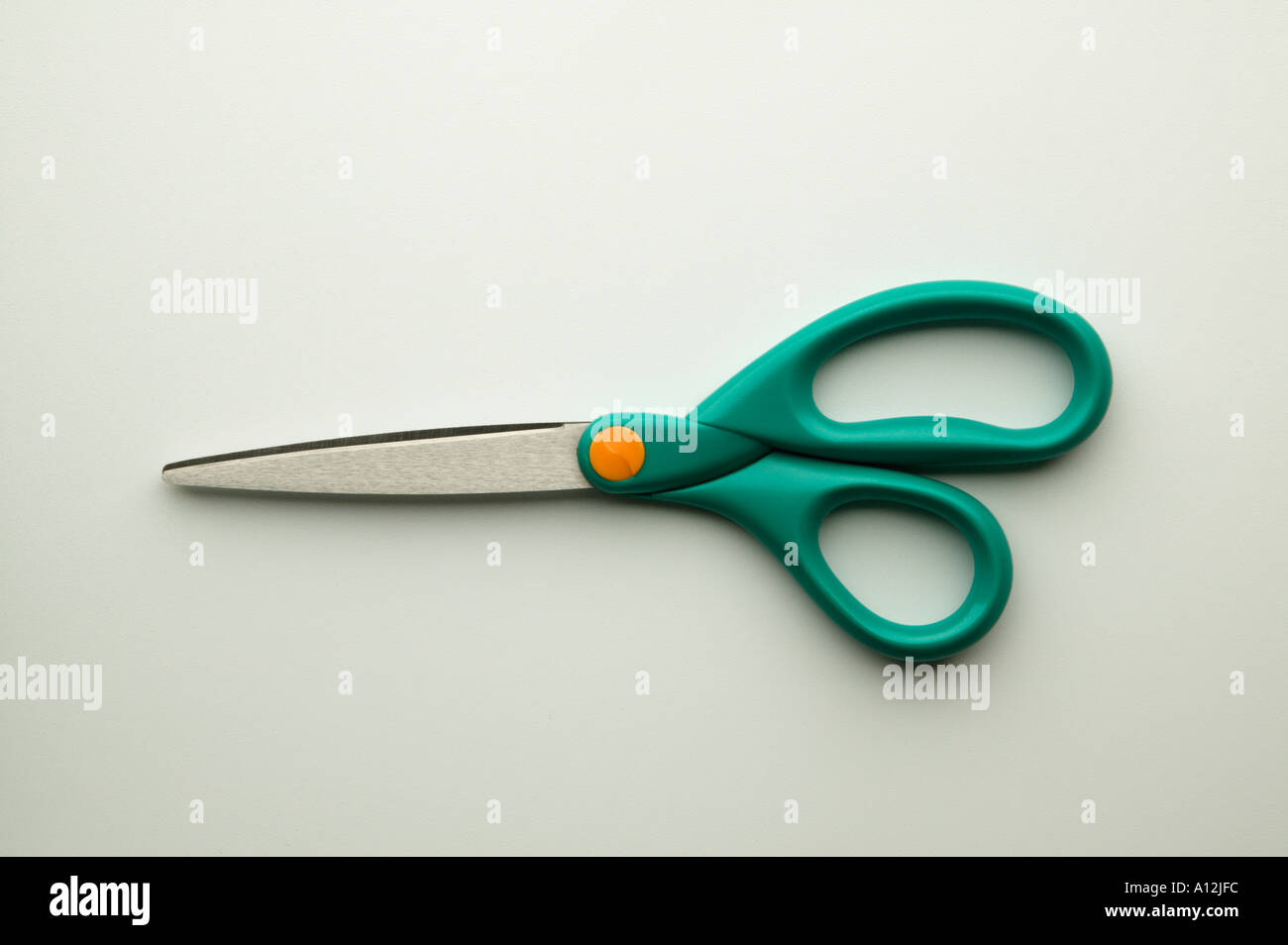 Closed scissors on white background Stock Photo - Alamy