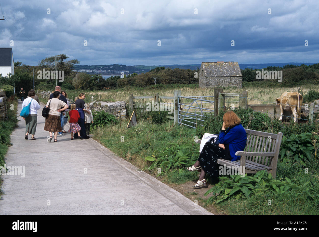 Hand on gate to pathway hi-res stock photography and images - Alamy