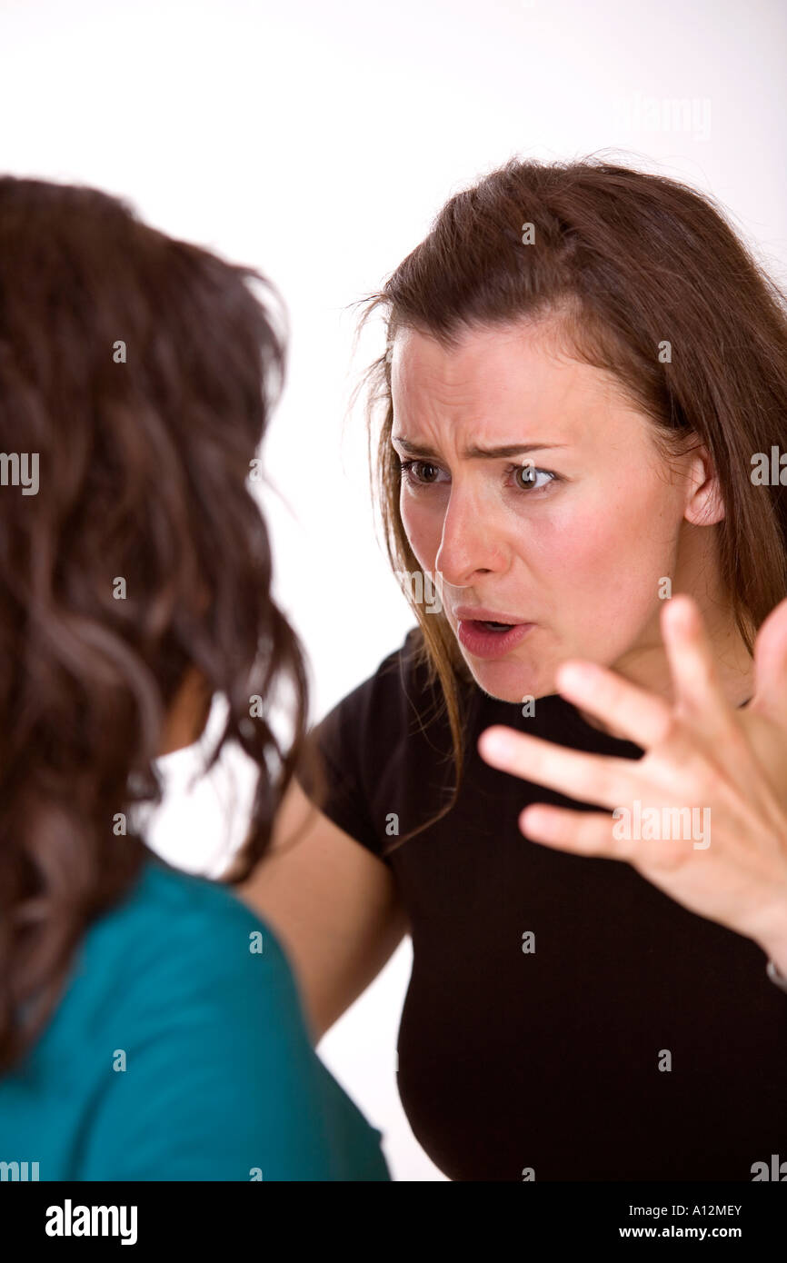Two women having an argument Stock Photo - Alamy