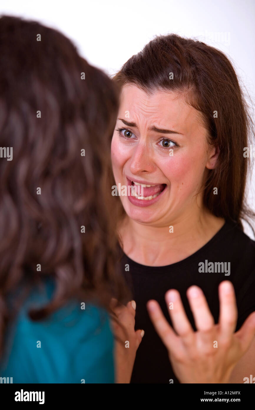Two women having an argument Stock Photo - Alamy