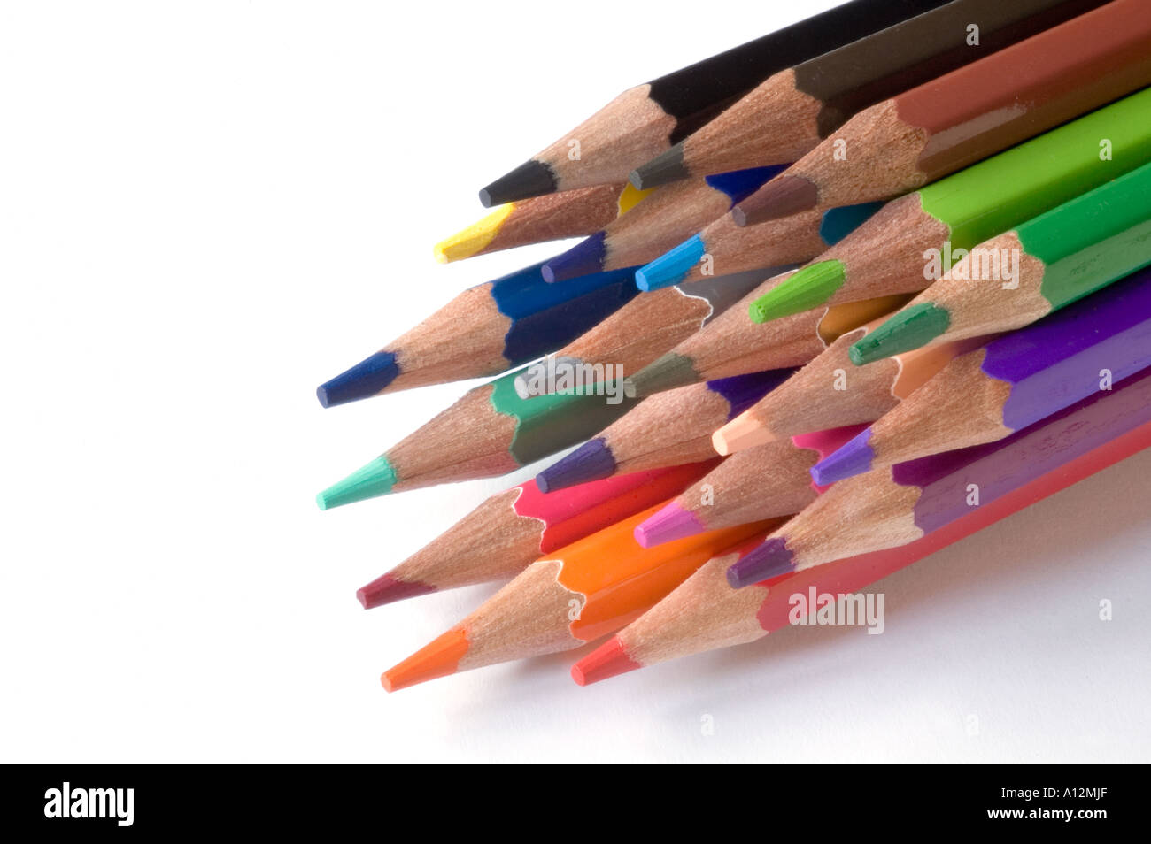Coloured pencils crayons against isolated white background Stock Photo ...