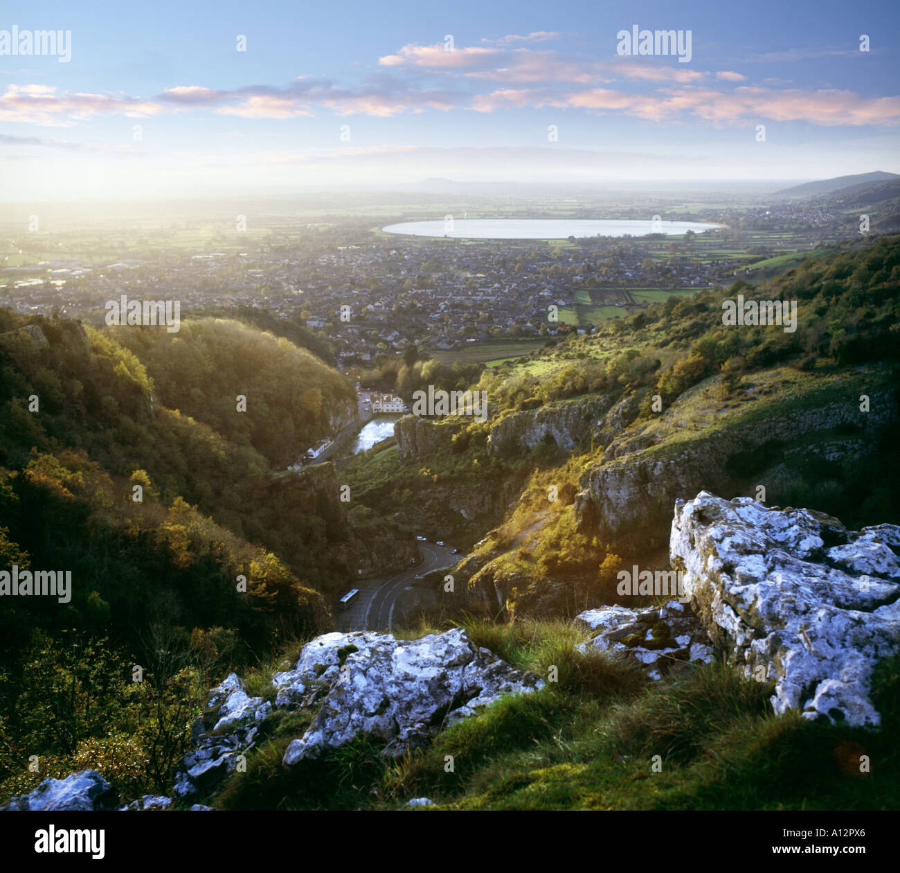 Cheddar Gorge in evening light looking towards Axbridge reservoir and ...