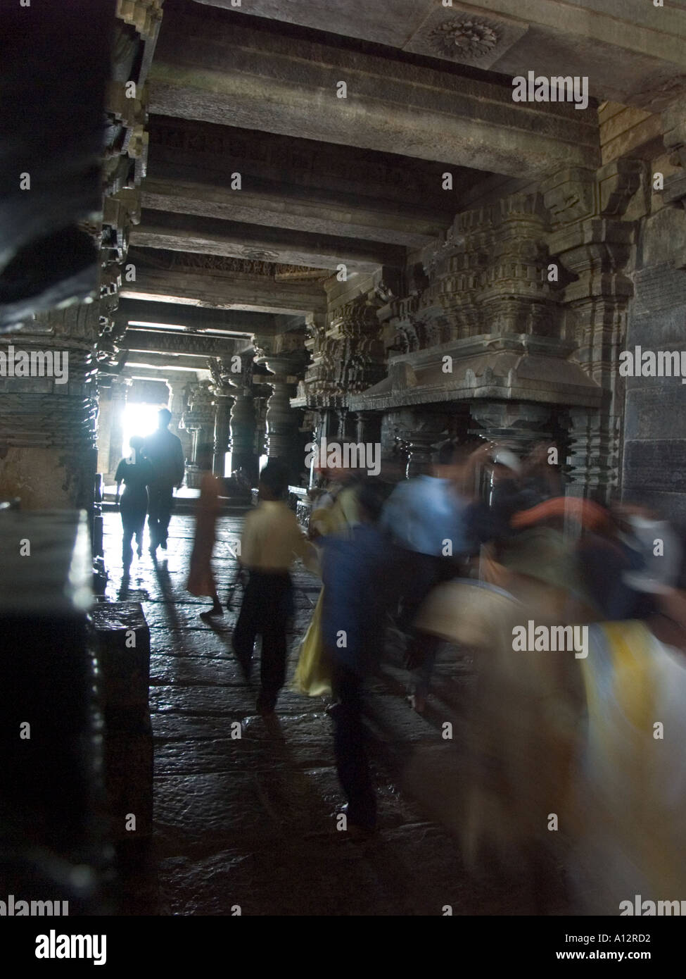 Pilgrims walking at a Hindu religious temple Stock Photo - Alamy