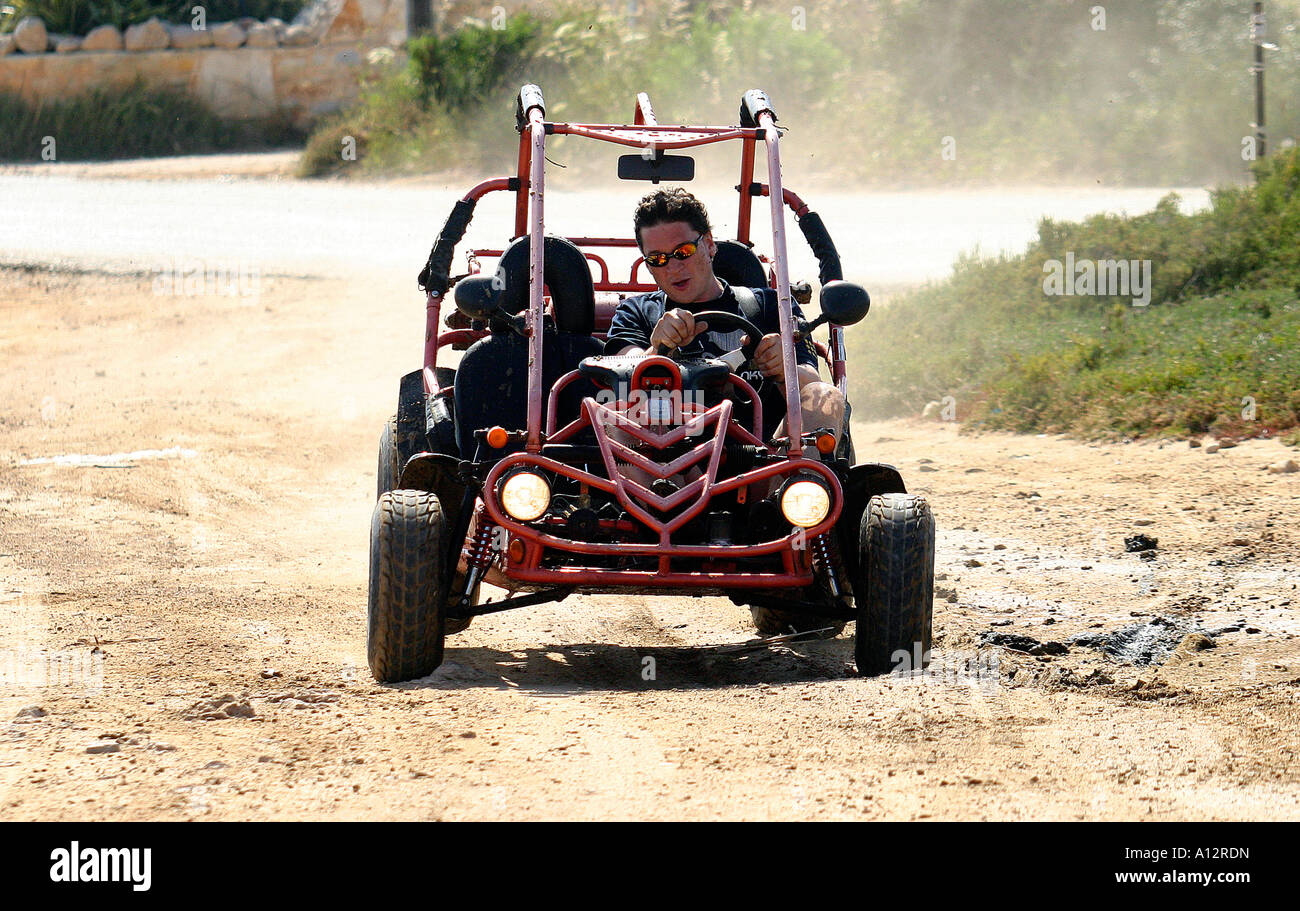 Dune buggy on empty beach on Paros island, Greek Cyclades Stock Photo ...