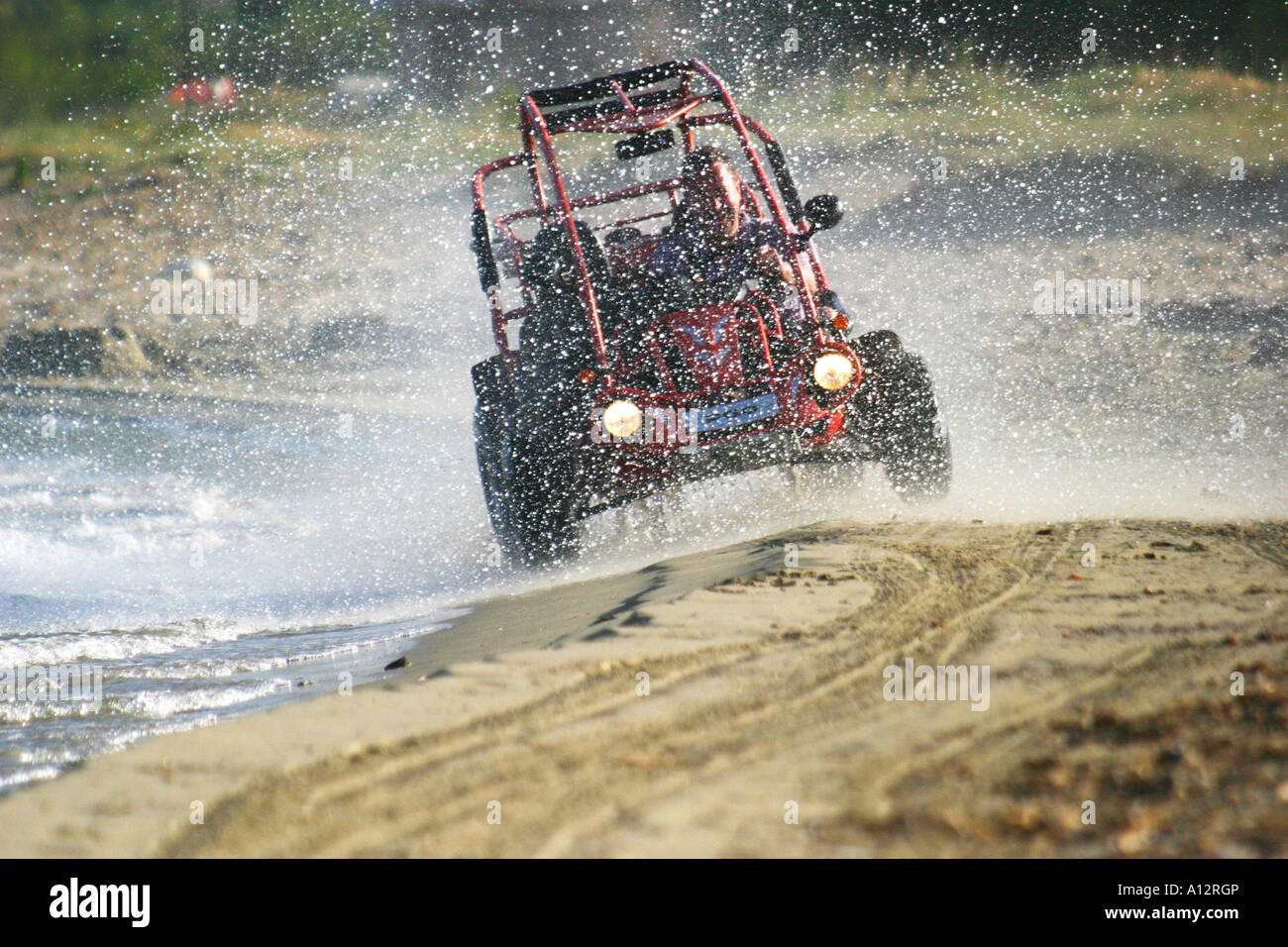 Dune buggy on empty beach on Paros island, Greek Cyclades Stock Photo ...