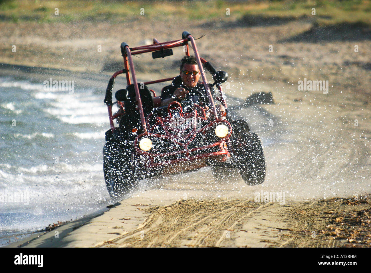 Dune buggy on empty beach on Paros island, Greek Cyclades Stock Photo ...