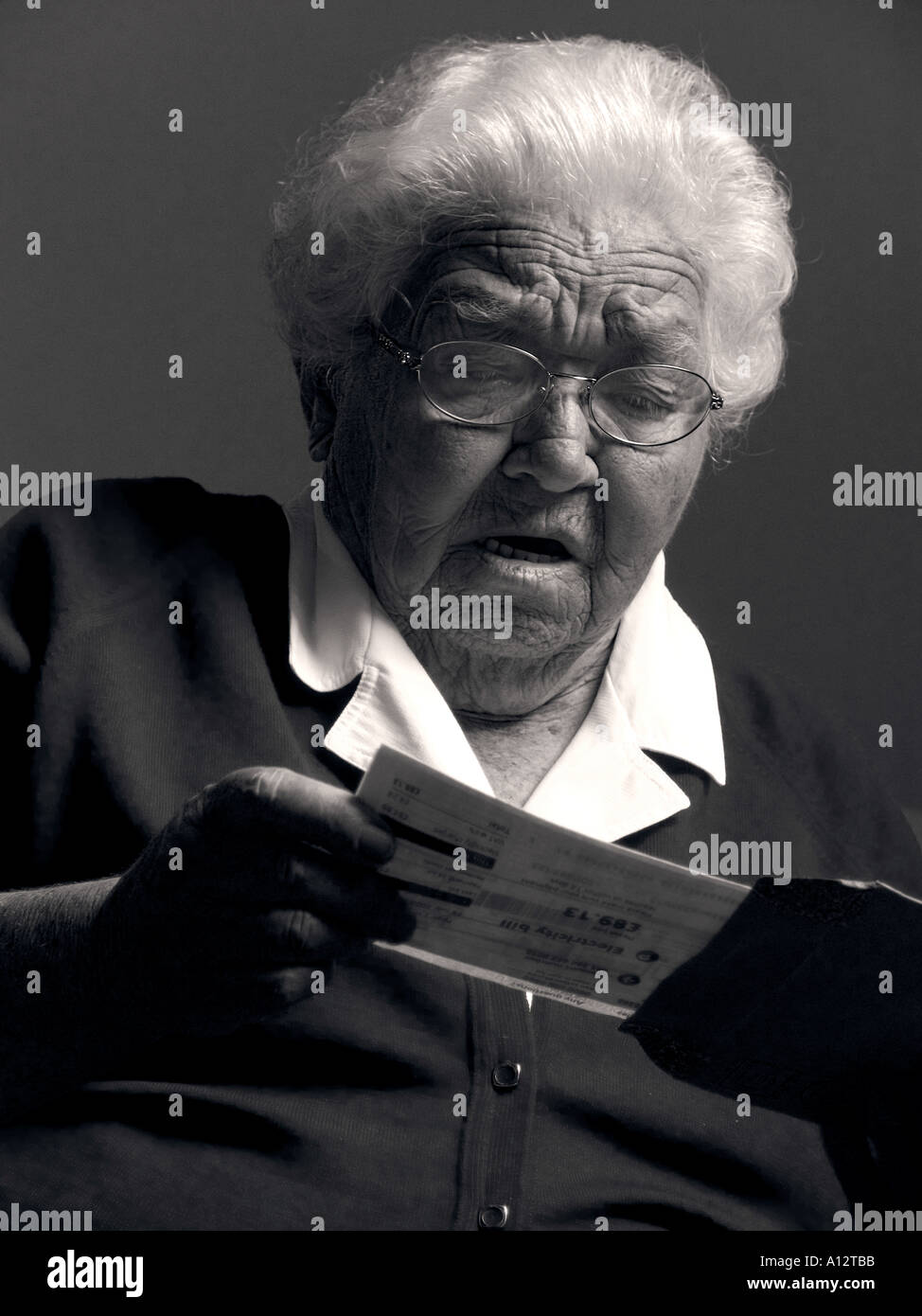 Old lady shocked bank letter hi-res stock photography and images - Alamy