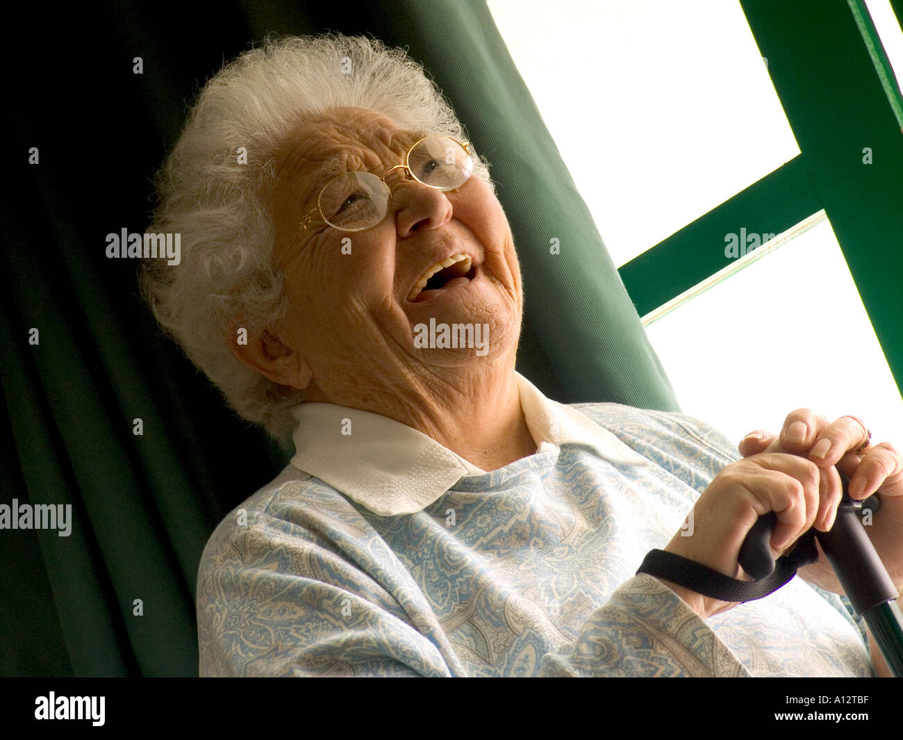 Elderly Lady Smiling Window High Resolution Stock Photography and ...