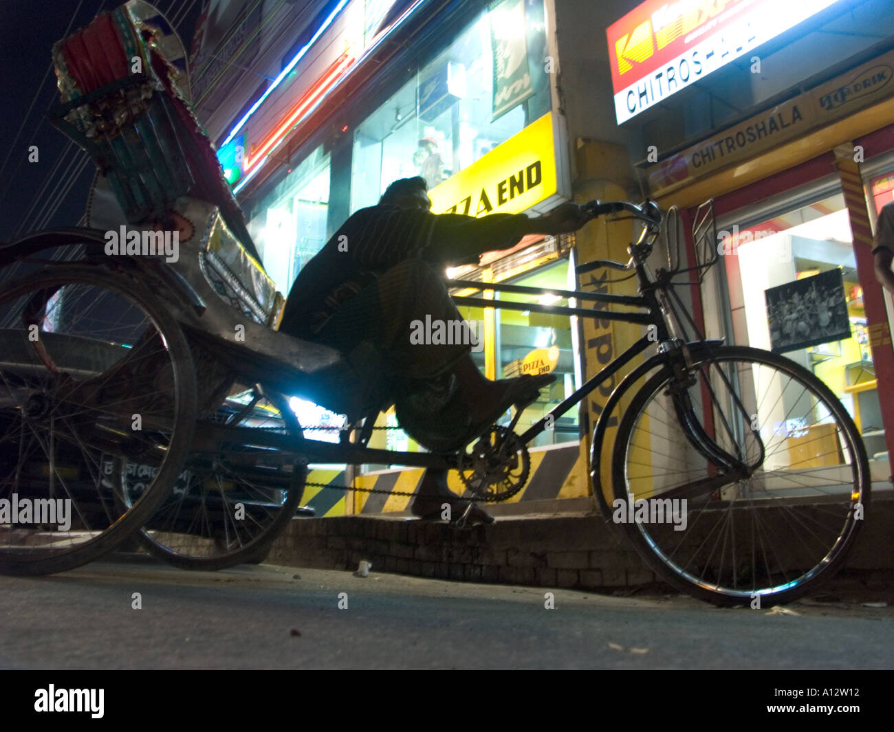 Drivers of three wheeled bicycle rickshaws taxis at work Stock Photo ...