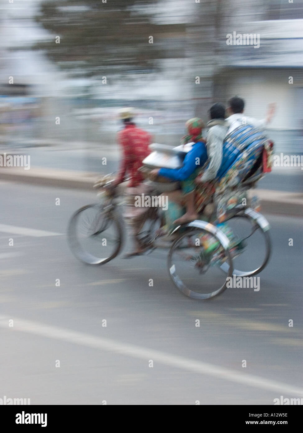 A three wheeled bicycle rickshaws taxis at work Stock Photo - Alamy