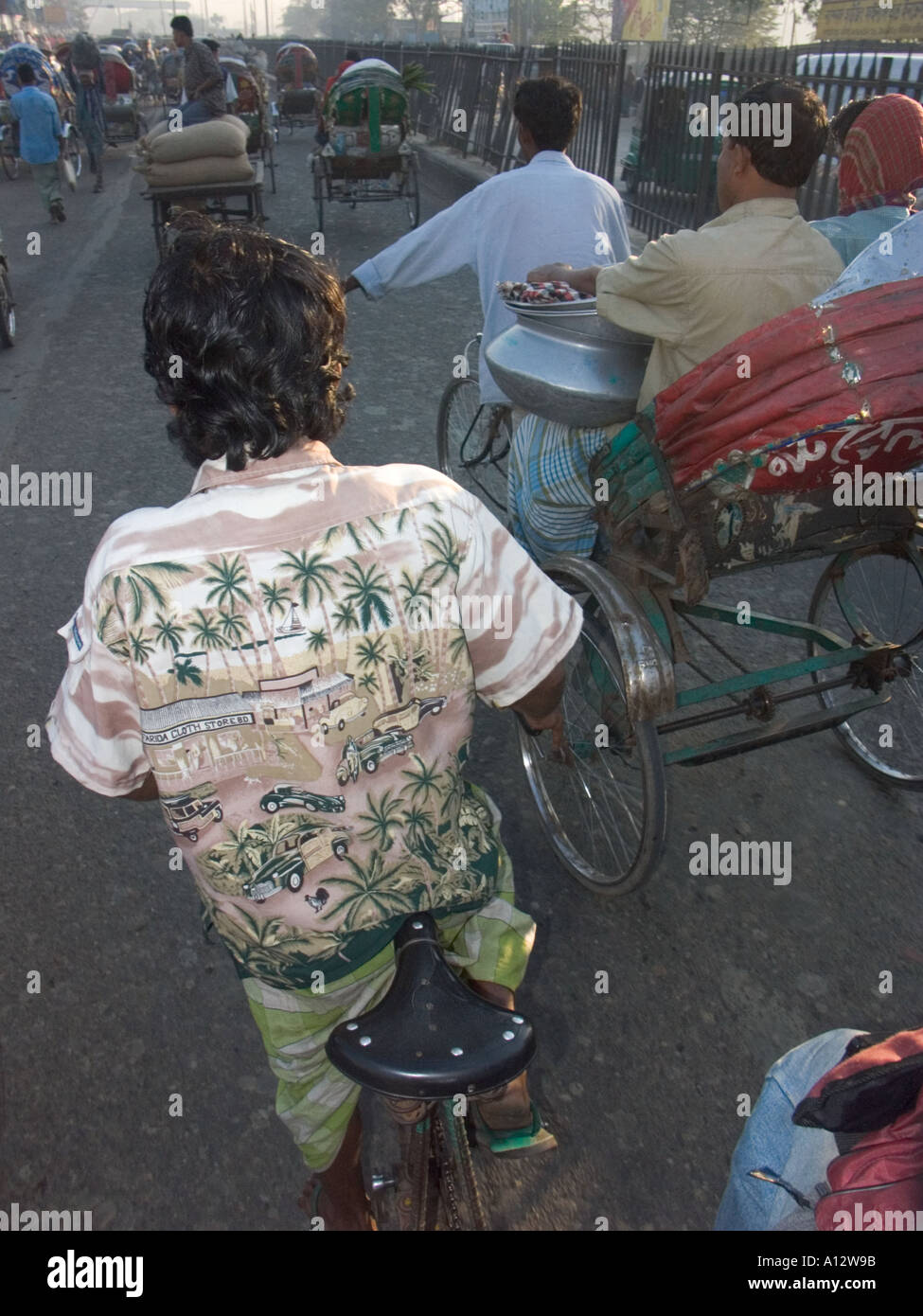Drivers of three wheeled bicycle rickshaws taxis at work Stock Photo ...