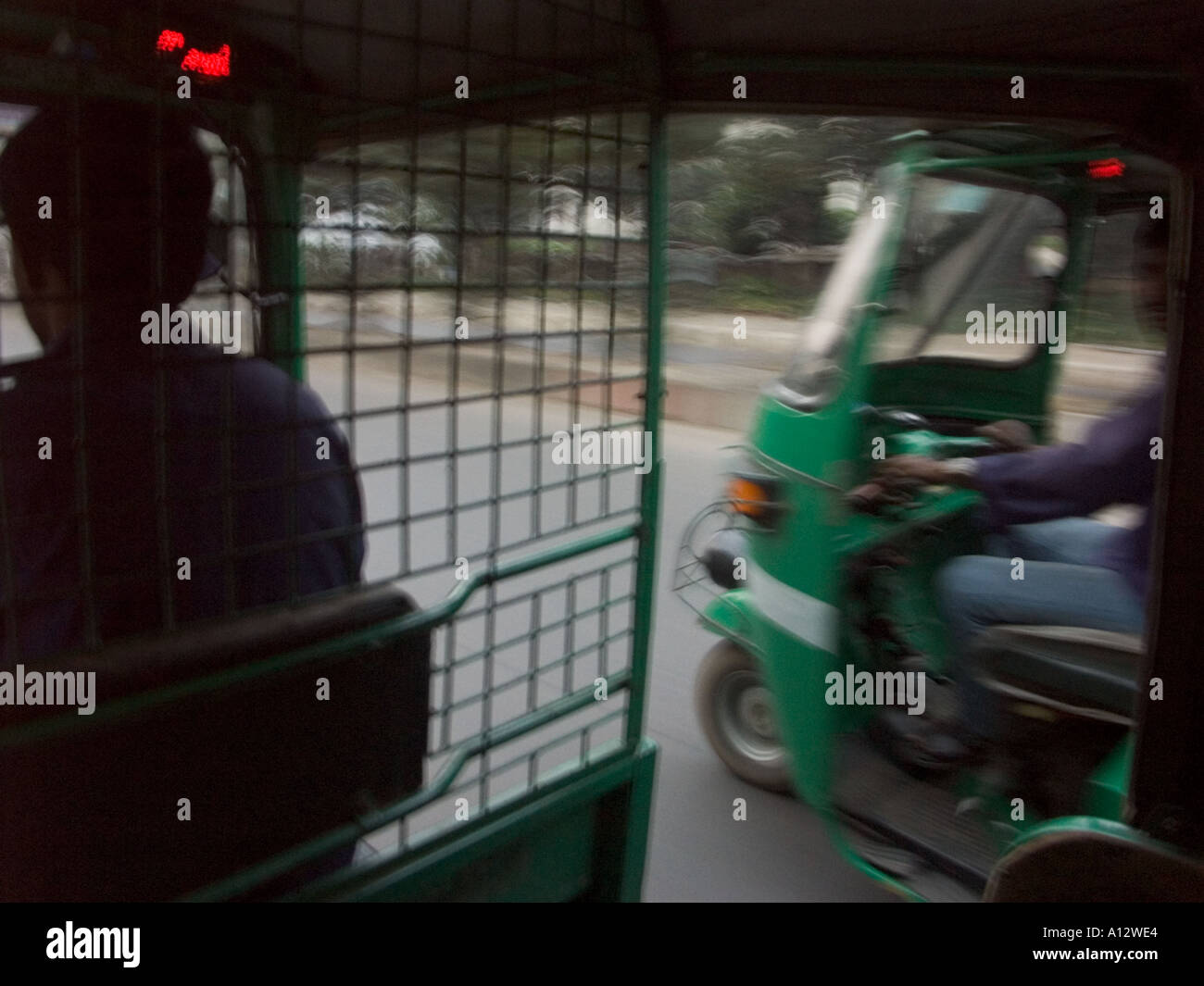 Blurred view from motorized rickshaw hi-res stock photography and ...