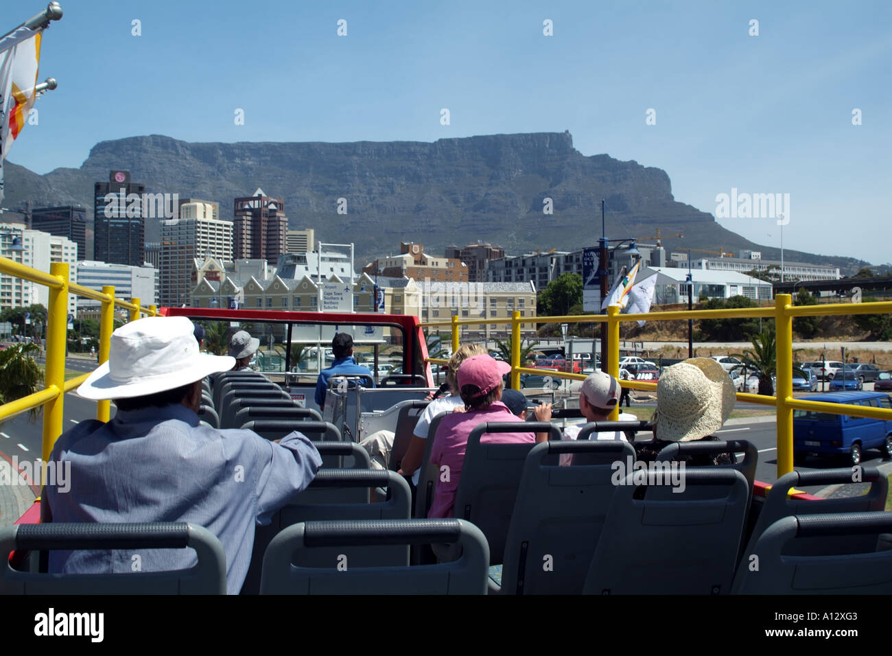 passengers on Cape Town city tour bus below Table Mountain South Africa ...