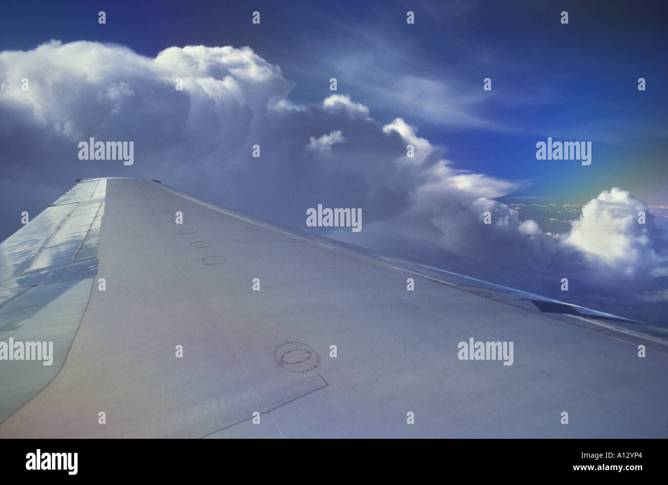 The wing of an airplane at cruising altitude Stock Photo - Alamy