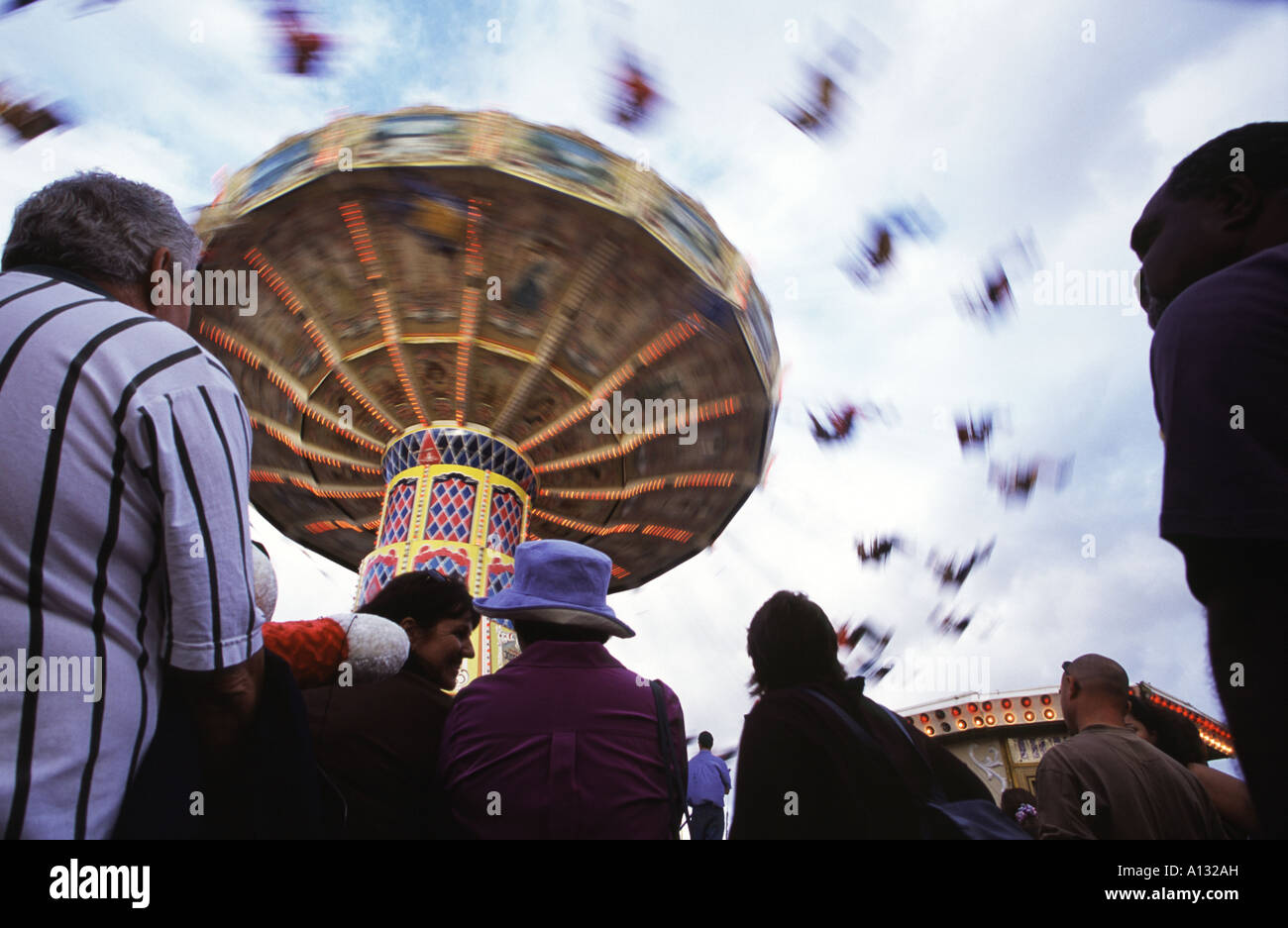 A spinning ride blurs through the air at the annual Cairns Show, far ...