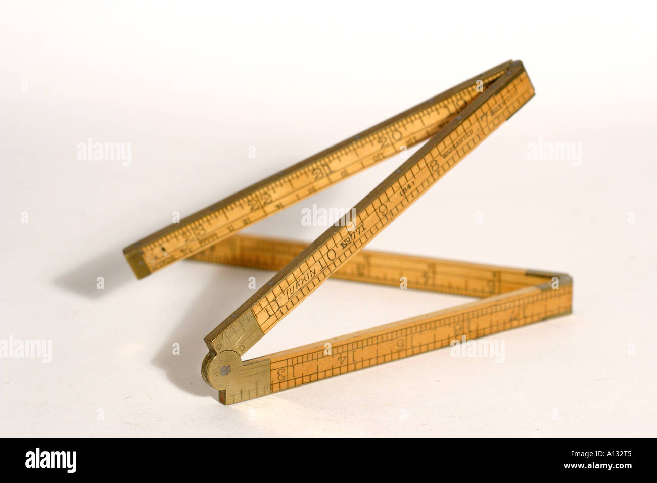 Folding carpenter rule Stock Photo - Alamy