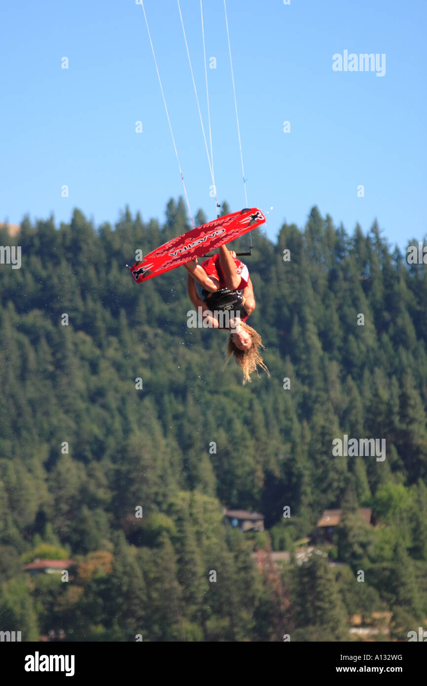 An extreme kiteboarding doing a flip Stock Photo - Alamy
