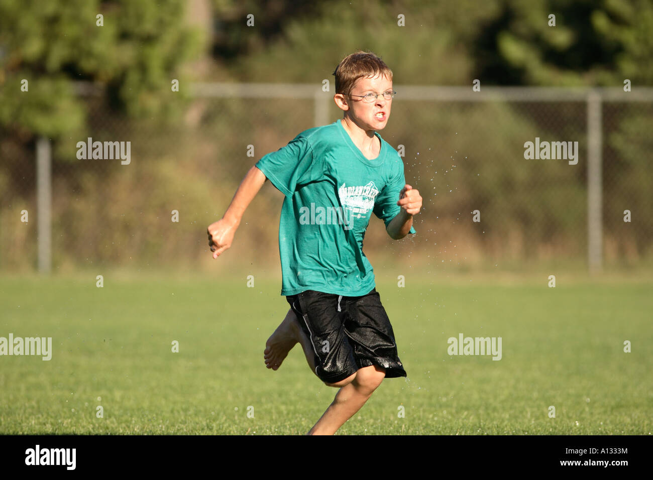 A boy running aggressively Stock Photo - Alamy