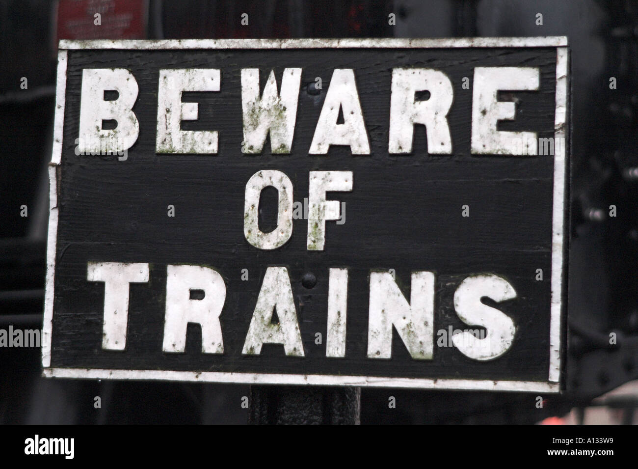 beware of trains sign Stock Photo - Alamy