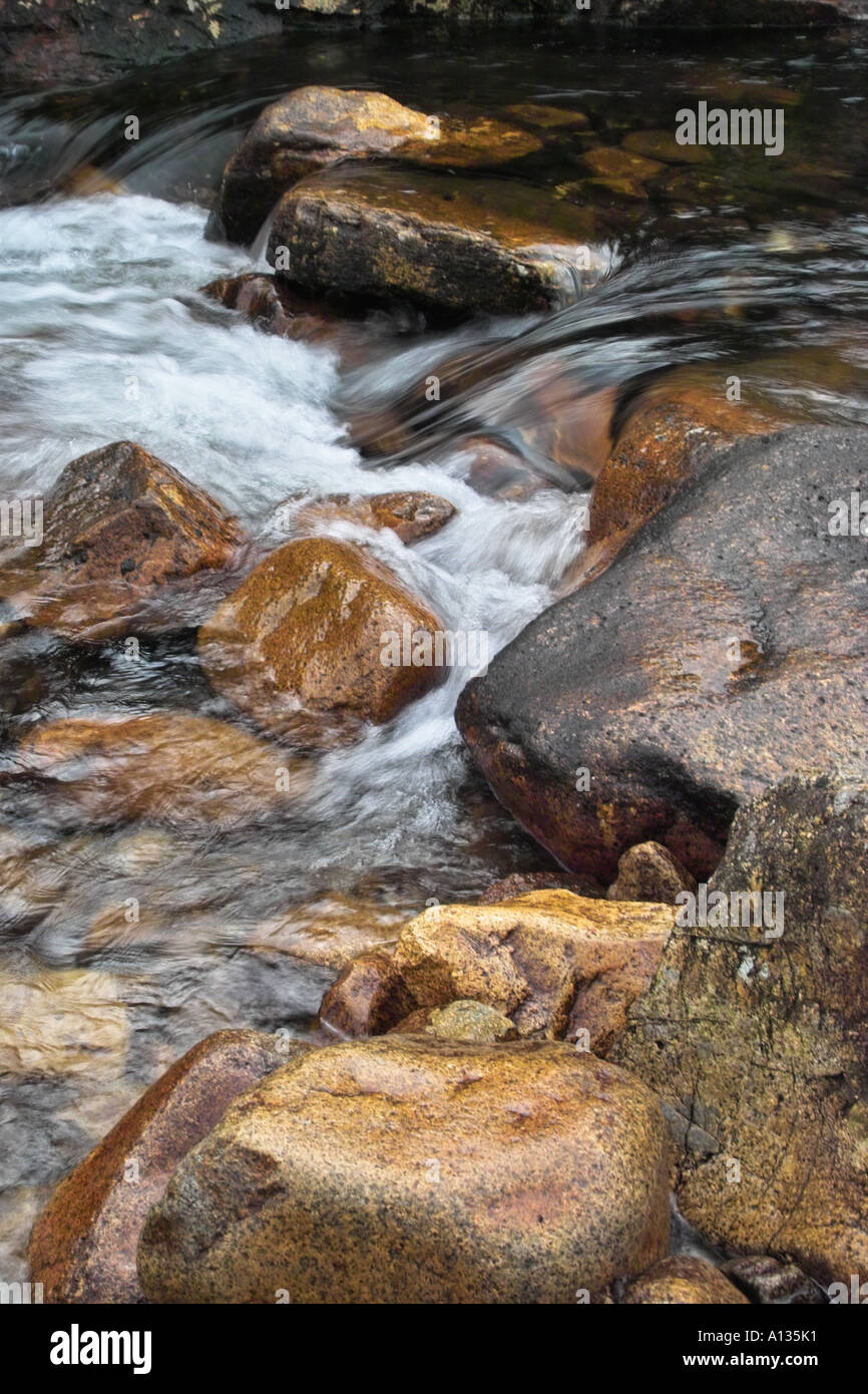 River flowing over rocks, Isle of Skye, Western Highlands Stock Photo ...