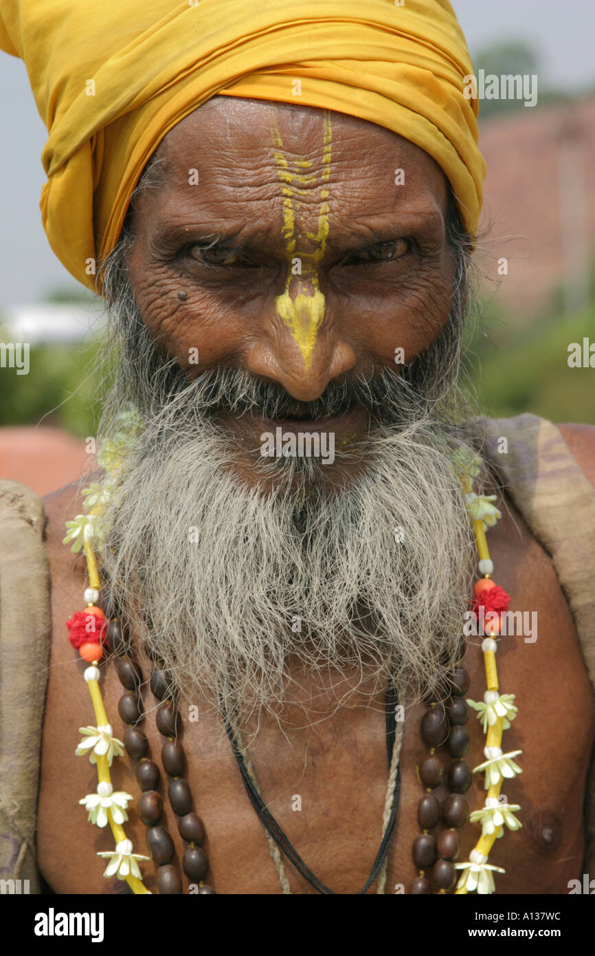 Portrait of a sadhu, a Hindu holy man, dressing traditional clothes ...