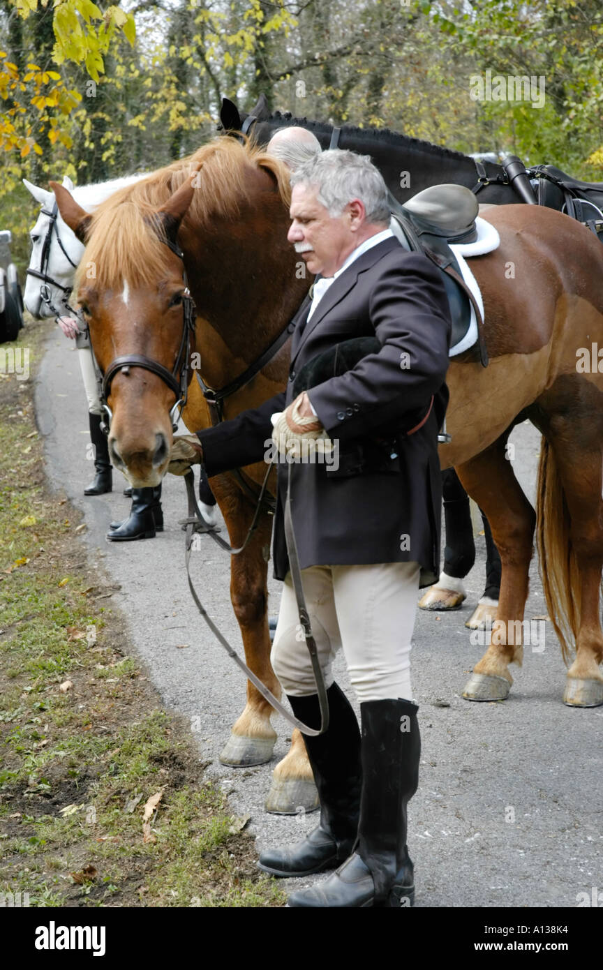 Foxhunter and horse at blessing Stock Photo - Alamy